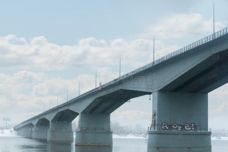 Grey Bridge with Lanterns Over Big River in Winter Day Stock Image ...