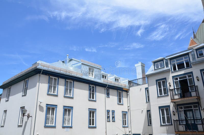 Grey Building or Structure with Blue Windows and Sky Stock Image ...