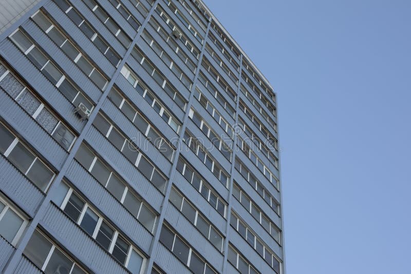 Grey Building with Windows. Tall Building in City Stock Image - Image ...