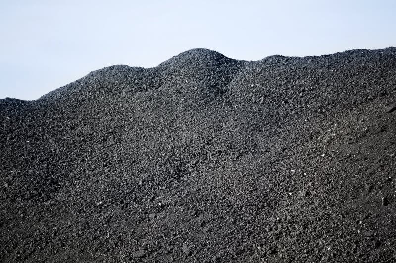 Grey Coal in Front of a Blue Sky. Stock Photo - Image of environmental ...