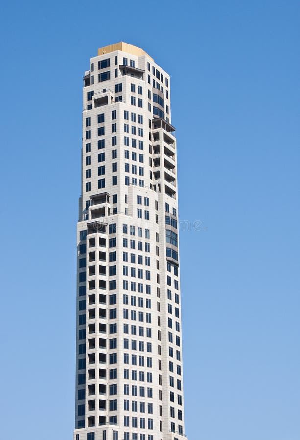 Grey Concrete Office Tower Rising Into Blue Sky Stock Image - Image of ...
