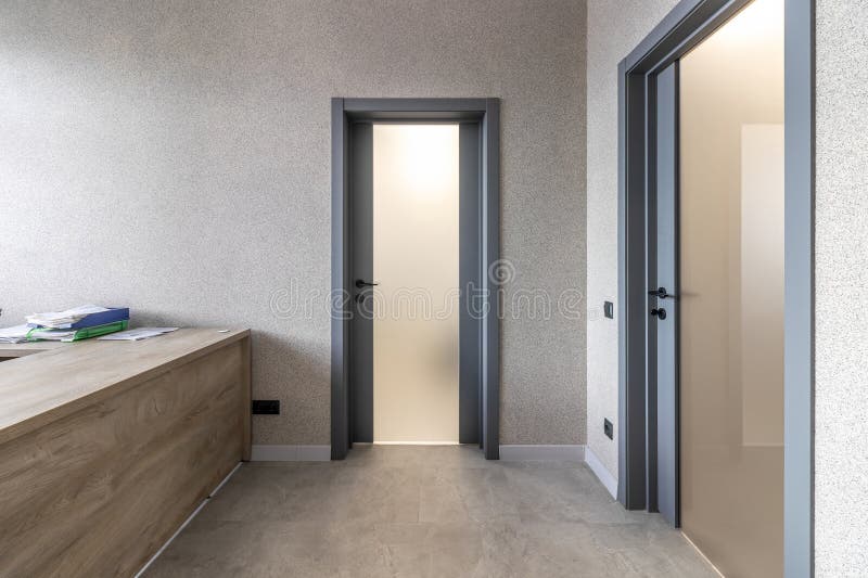 Grey Door with Glass Insert in Office Building Stock Image - Image of ...