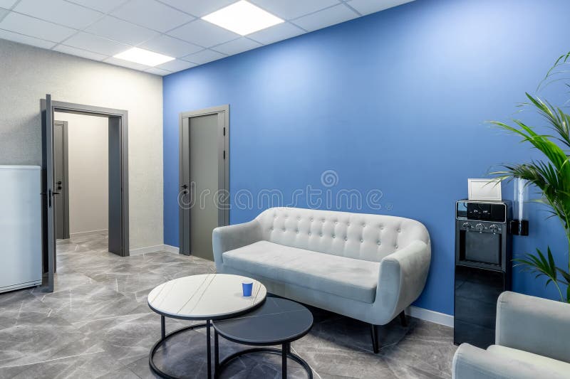 Grey Doors with Glass Insert in Office Space with Blue Wall and ...