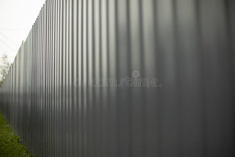 Grey Fence Made of Metal. Solid High Fence Stock Image - Image of ...