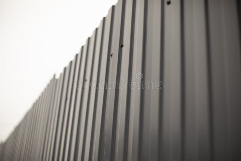 Grey Fence Made of Metal. Solid High Fence Stock Photo - Image of link ...