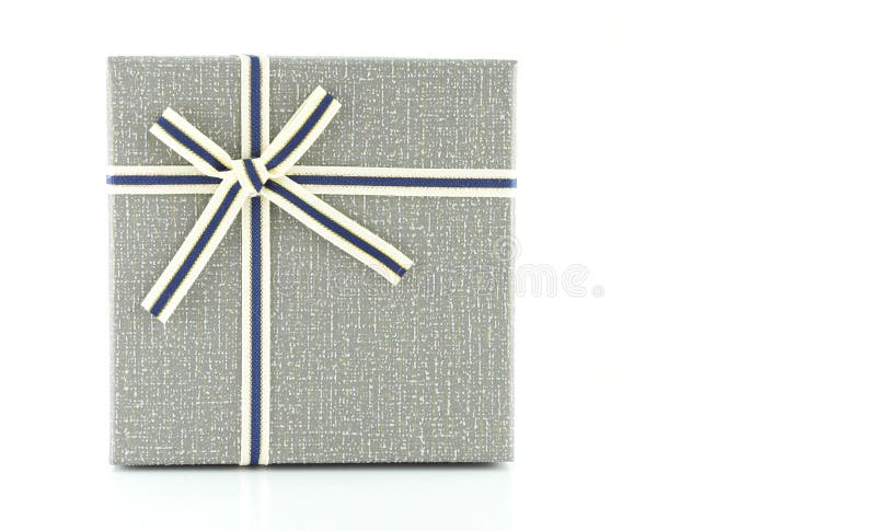 Grey Gift Box with Ribbon on Green Grass with Sun Light in the Morning ...