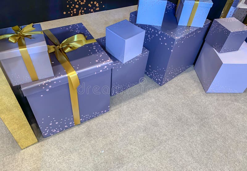 Grey Gift Boxes with Dot Pattern on Grey Carpet Floor, Decorated with ...