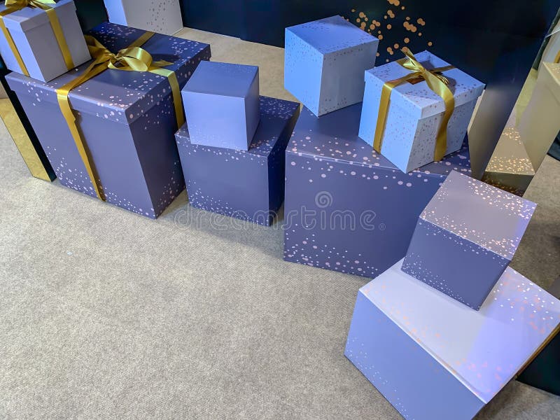 Grey Gift Boxes with Dot Pattern on Grey Carpet Floor, Decorated with ...