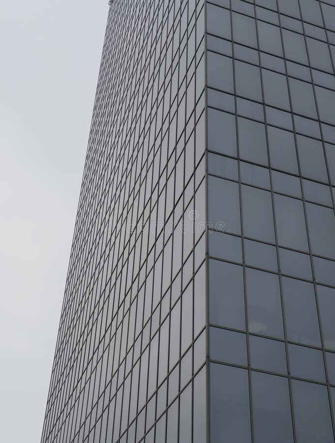 Grey Glass Skyscraper and Overcast Sky Stock Image - Image of outside ...