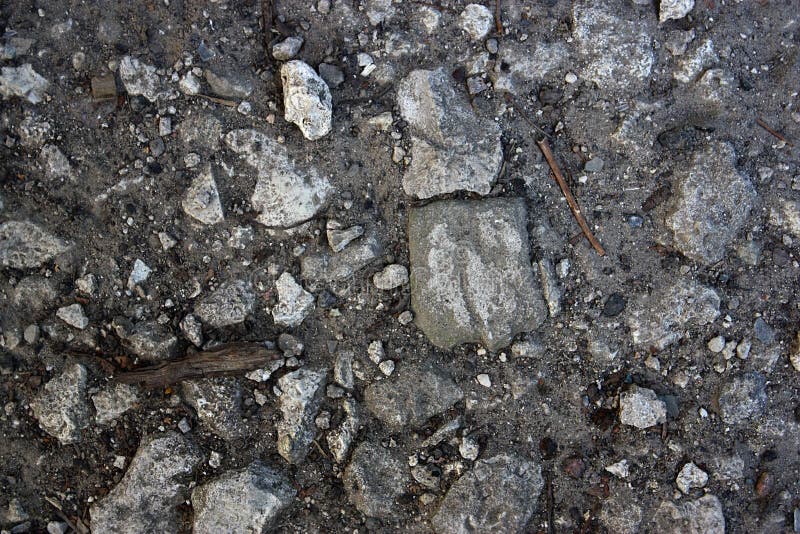 Grey Ground with Different Stones and Sticks Stock Image - Image of ...