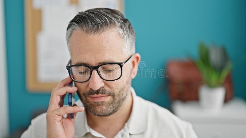 Grey-haired Man Business Worker Talking on Smartphone at the Office ...