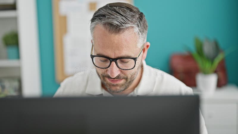 Grey-haired Man Business Worker Using Computer Thinking at the Office ...