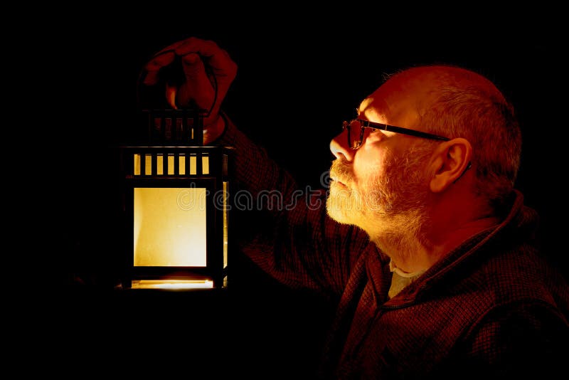 Grey Haired Man Holding a Lantern Stock Photo - Image of caucasian ...