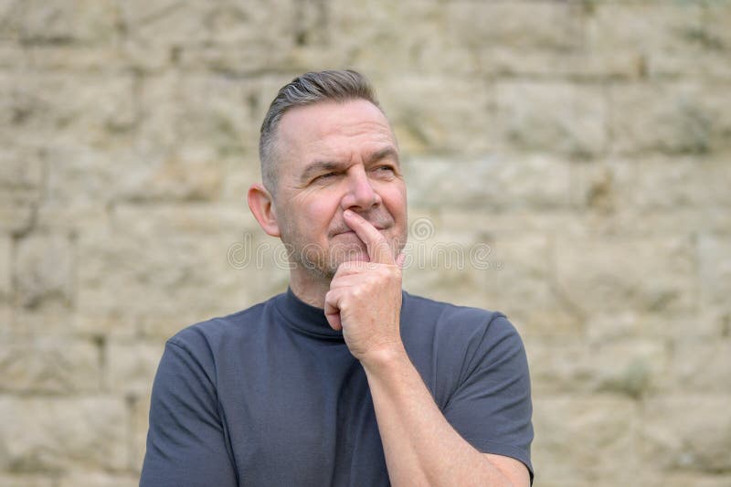 Grey Haired Man Standing in Front of a Wall Stock Image - Image of ...