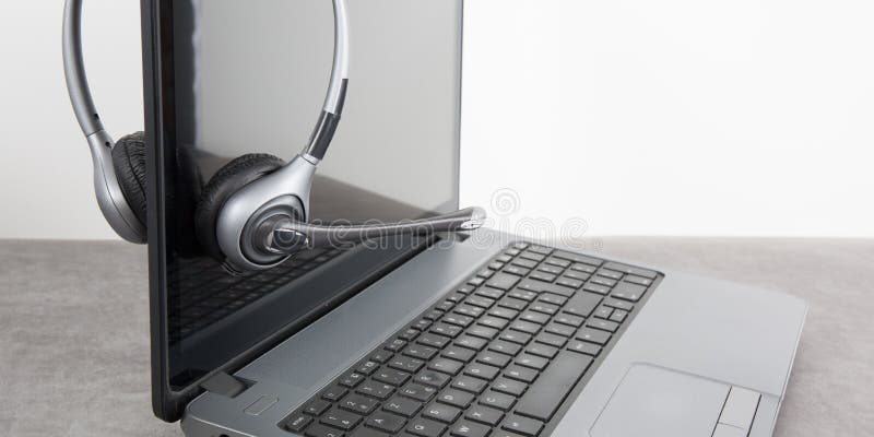 Grey Headset with Computer Laptop on Grey Desk Call Center Support and ...
