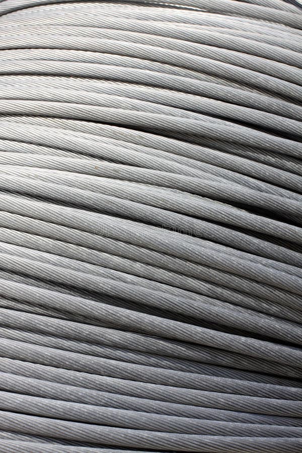 Grey metal cable stock photo. Image of coil, rolled, coiled - 15618058