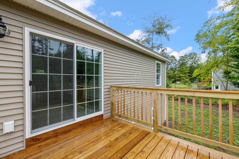 Grey Modern Construction of Contemporary Raised Ranch Surrounded by ...
