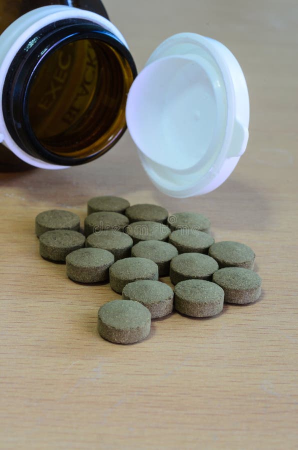 Grey pill with bottle stock image. Image of medicare - 40364987