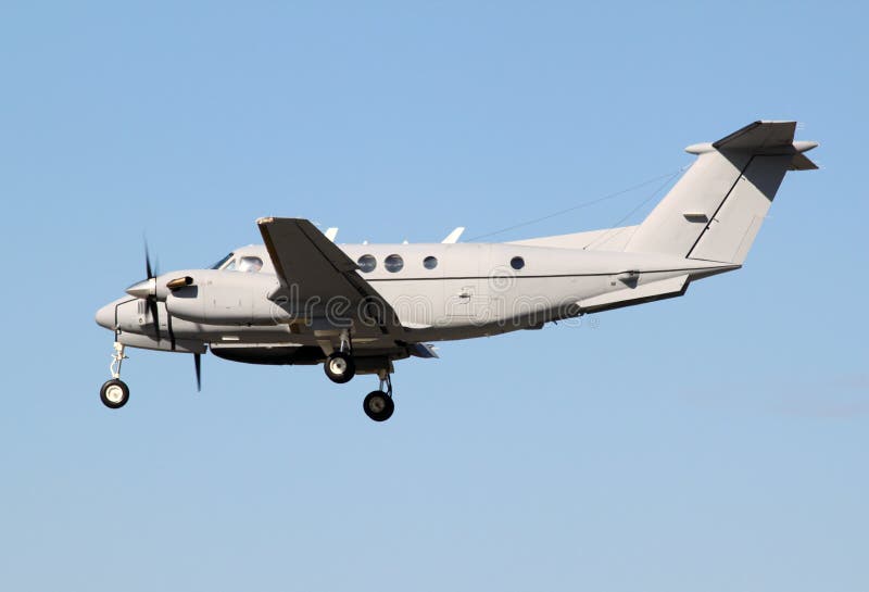 Grey plane landing stock image. Image of expensive, flight - 57727151