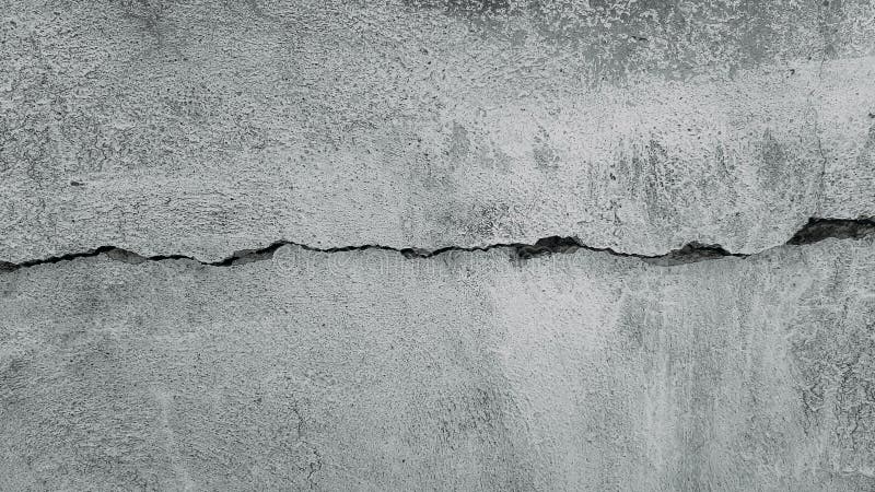 Grey Plaster Facade House Wall with Dark Cracks. Close-up of Cracked ...