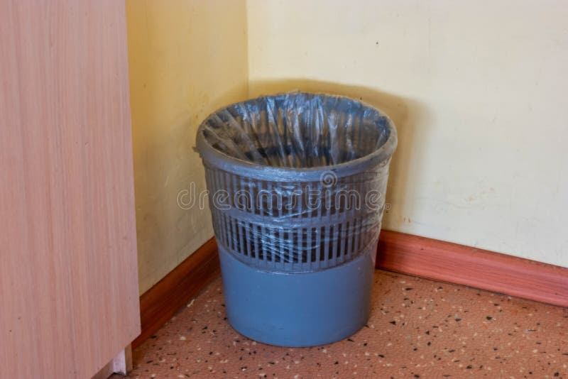 Grey Plastic Bin with Clear Plastic Bag Inside for Use in the Office ...