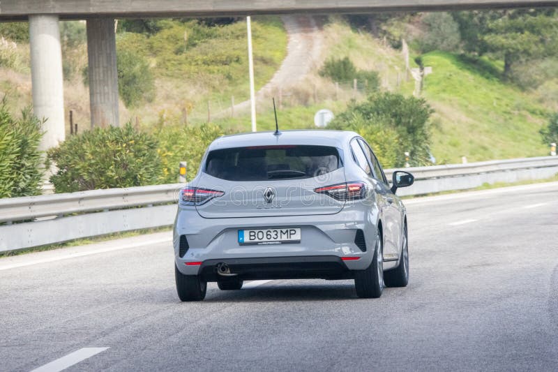 Grey Renault Clio Driving on a Highway Under a Bridge Editorial ...