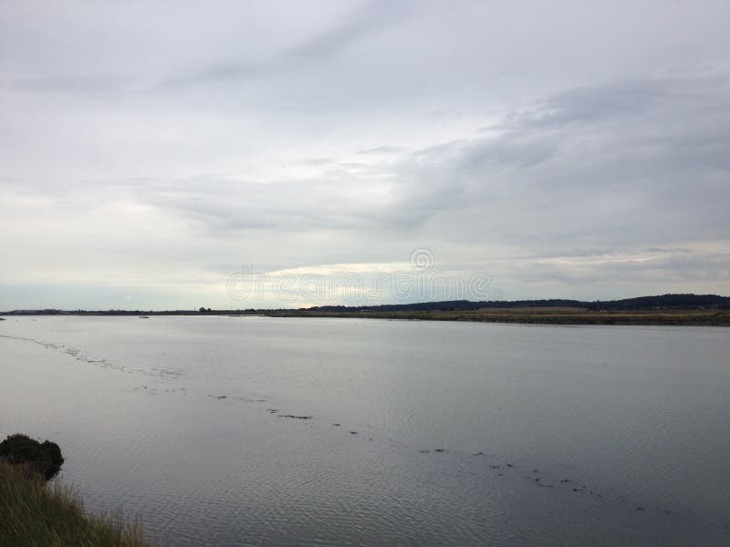 Grey river stock image. Image of dark, grey, still, river - 97258365