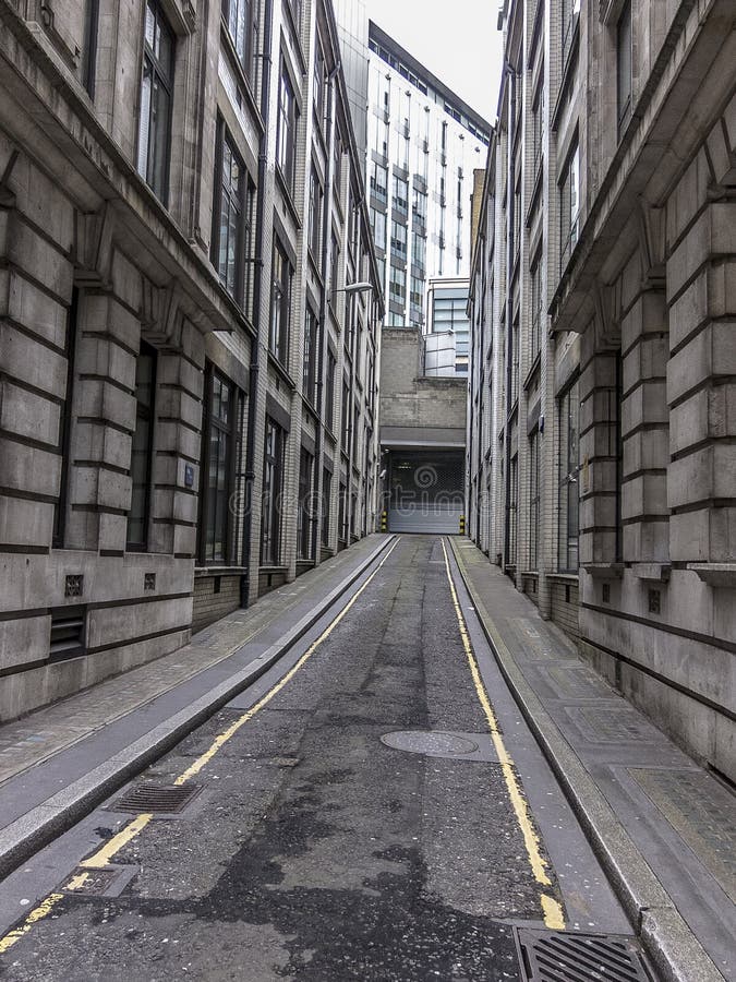 Road between Buildings stock image. Image of windows - 113646779