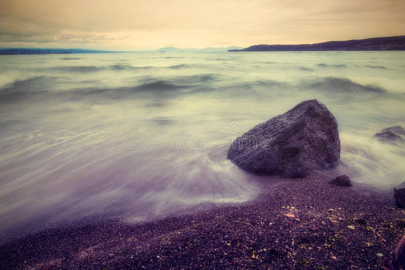 Grey Rock On Beach stock photo. Image of tide, beach - 114378668