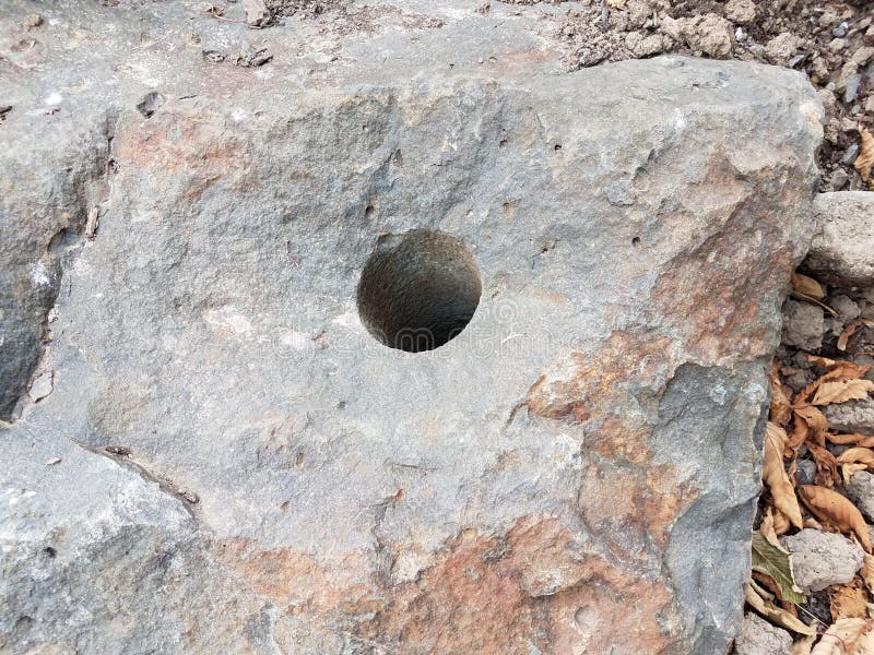 Circular Stone from Grinding Mill in Ground Near Old Brick Wall Stock ...