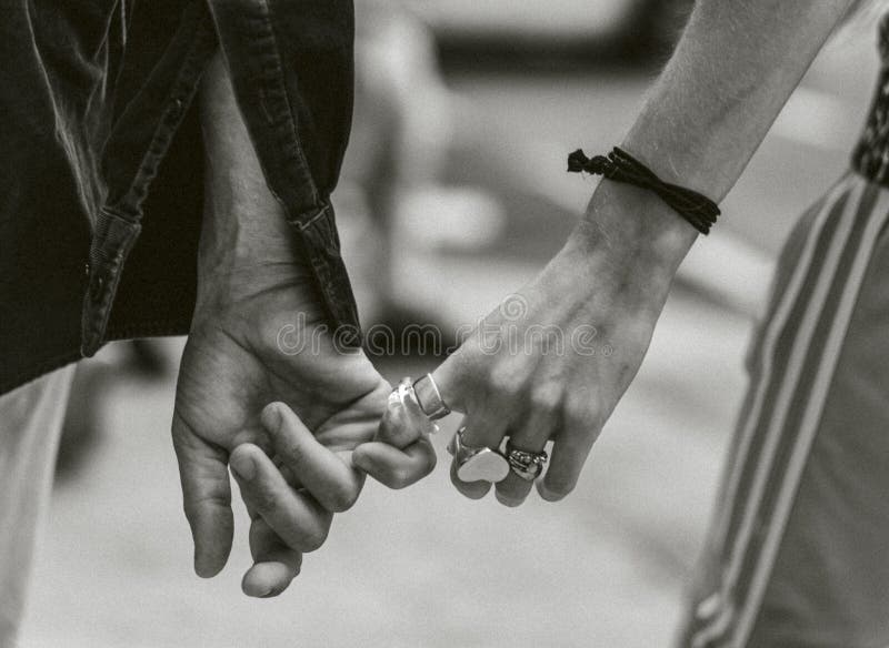 Grey Scale Shot of a Couple Holding Hands - Concept of Love and ...