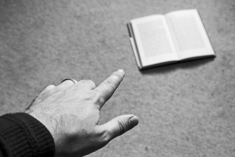 Finger pointing on a book stock image. Image of book - 16701603