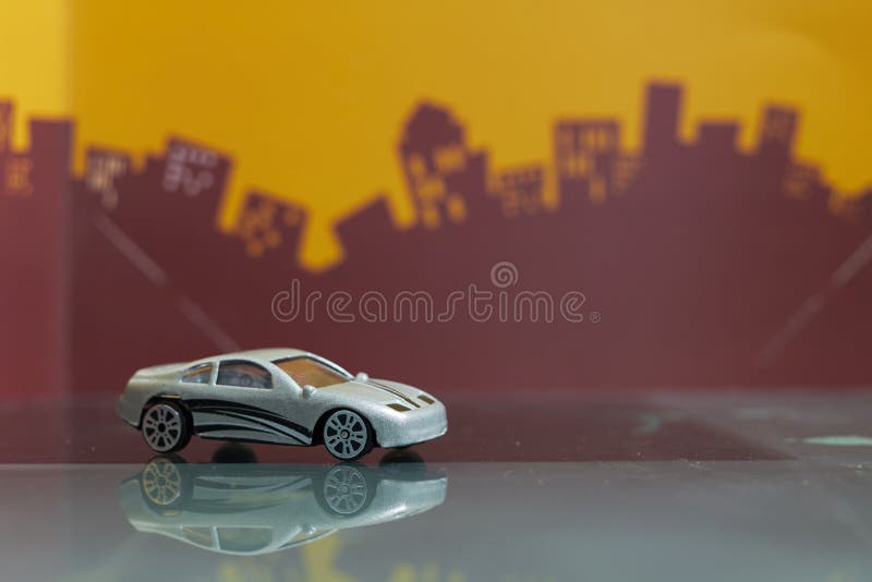 Grey Sedan Car Toy Selective Focus on Blur City Background Stock Photo ...