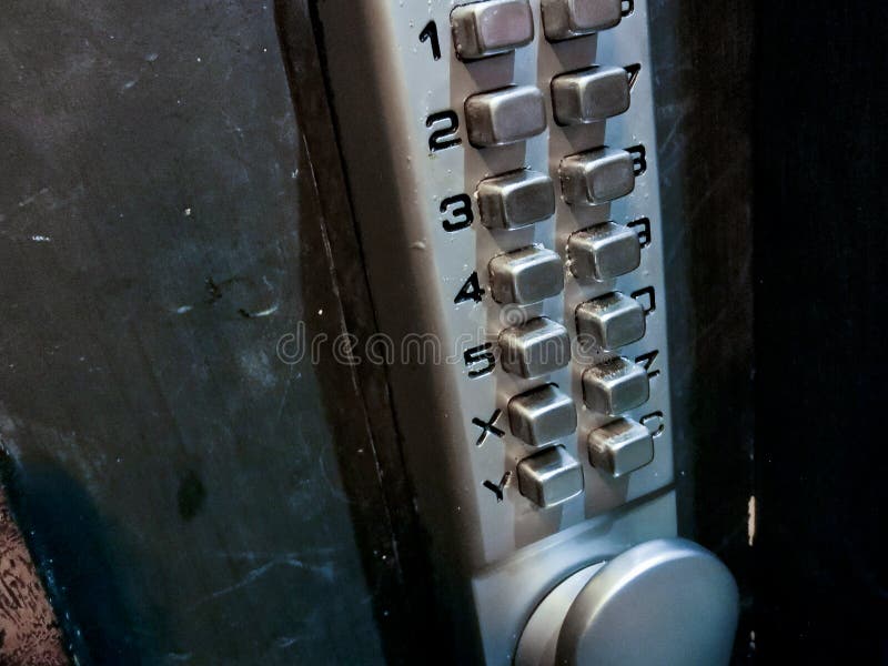 Grey Silver Number Keypads Security Door Locker on Black Door Stock ...