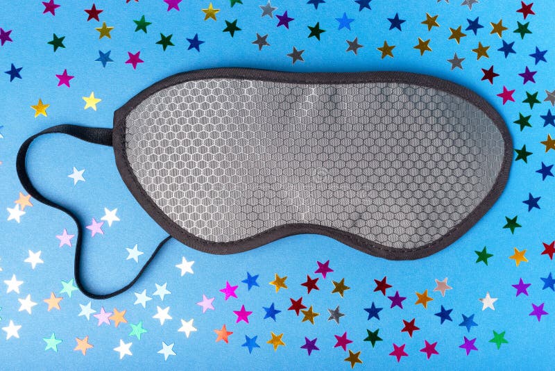 Grey Sleep Mask on Blue Background with Stars , View from Above Stock ...
