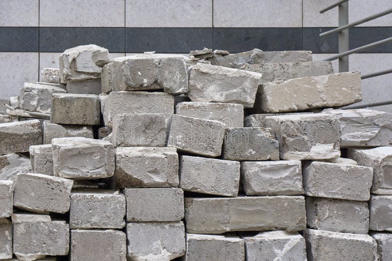 Grey Stone Bricks Stacked Against the Wall. Stock Photo - Image of ...