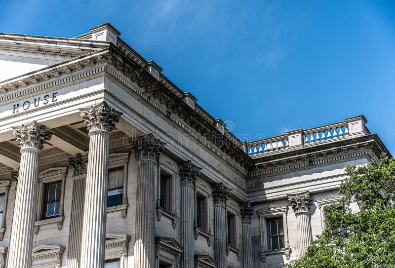 Grey Stone Building with a White Clock Tower on the Side Stock Image ...