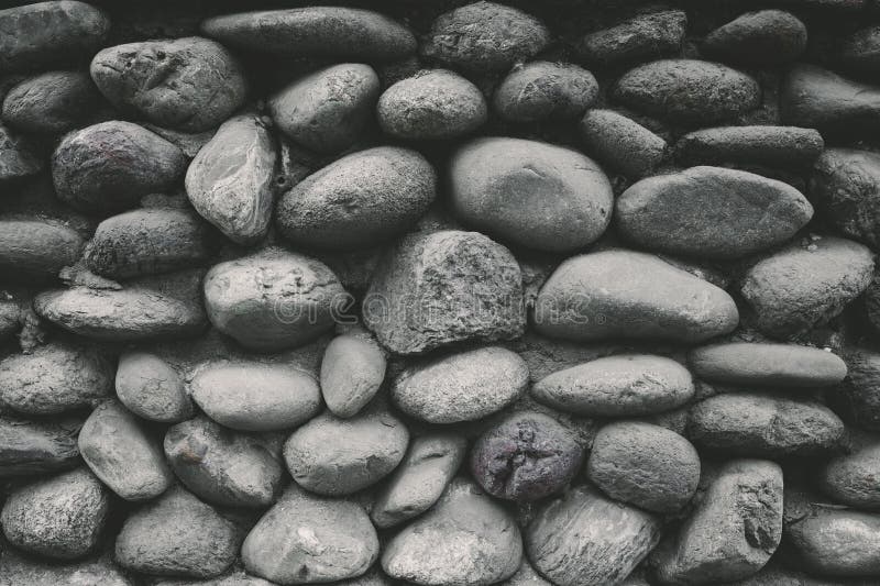 Grey Stone Siding with Different Size Stones Stock Photo - Image of ...
