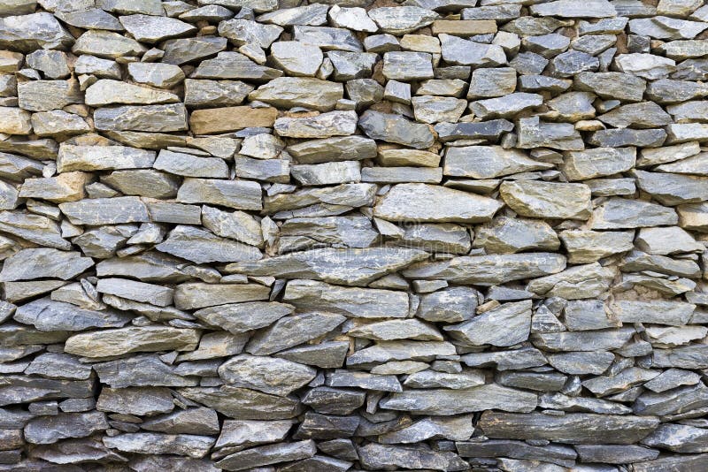 Grey stone wall background stock photo. Image of detail - 185193902