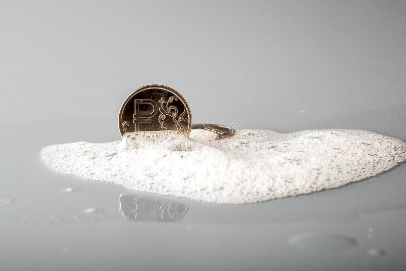 On the Grey Surface Foam Which is Visible from the Coin Stock Image ...