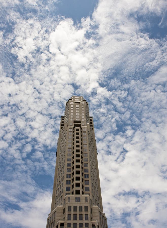 Grey Tower into Clouds stock image. Image of building - 12398887