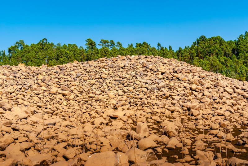 Grey wall of round stones. stock photo. Image of design - 114371668