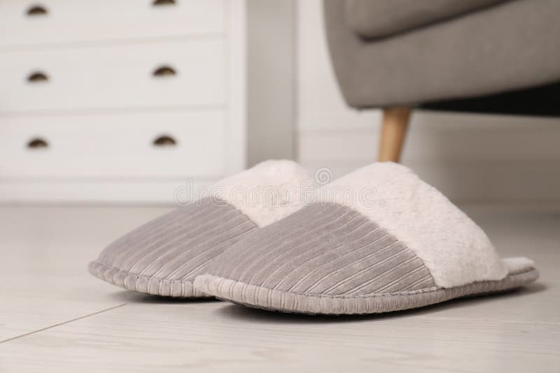 Grey Warm Slippers on Floor in Room Stock Image - Image of shoes, pair ...