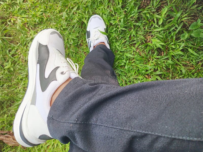 Grey White Shoes on Fresh Green Grass. Stock Image - Image of grey ...