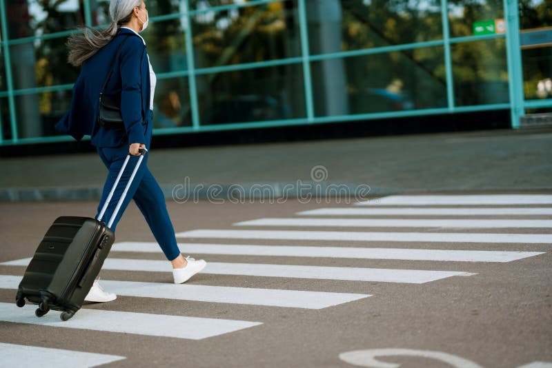 Grey Woman in Face Mask Walking with Suitcase on Zebra Crossing Stock ...