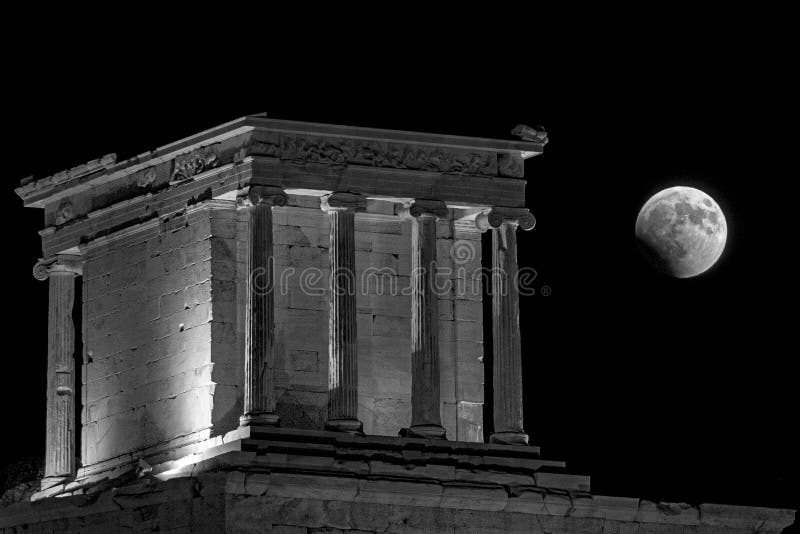 Greyscale of a Roman Temple Under the Lights during the Night with a ...