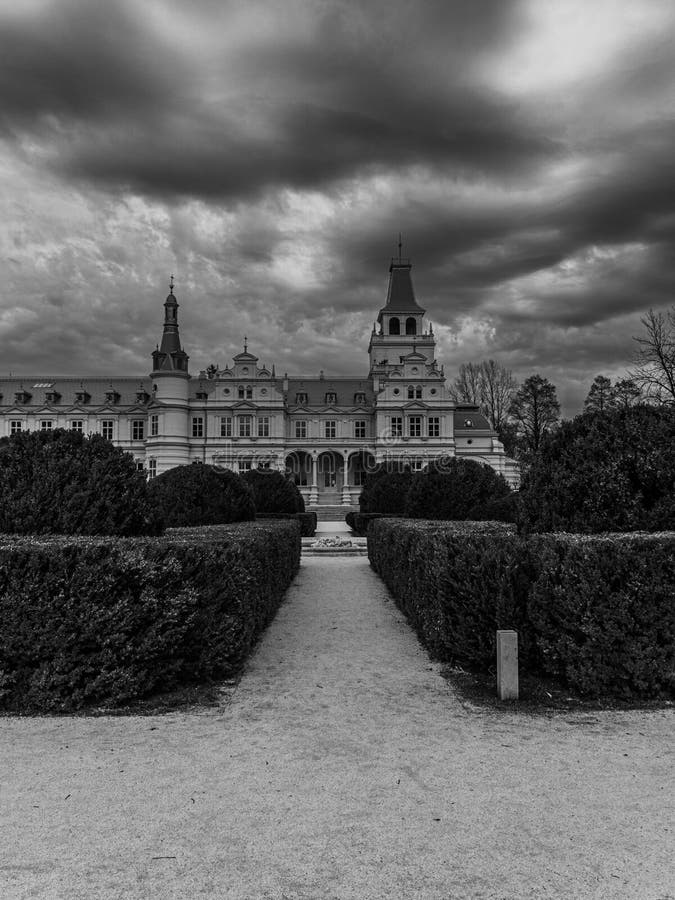 Greyscale Shot of a Castle with Dark Clouds Stock Photo - Image of ...