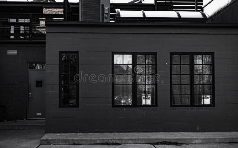 Greyscale Shot of a Modern House Stock Image - Image of modern ...