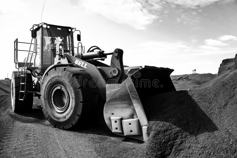 Greyscale Shot of a Payloader Tractor Editorial Photo - Image of ...