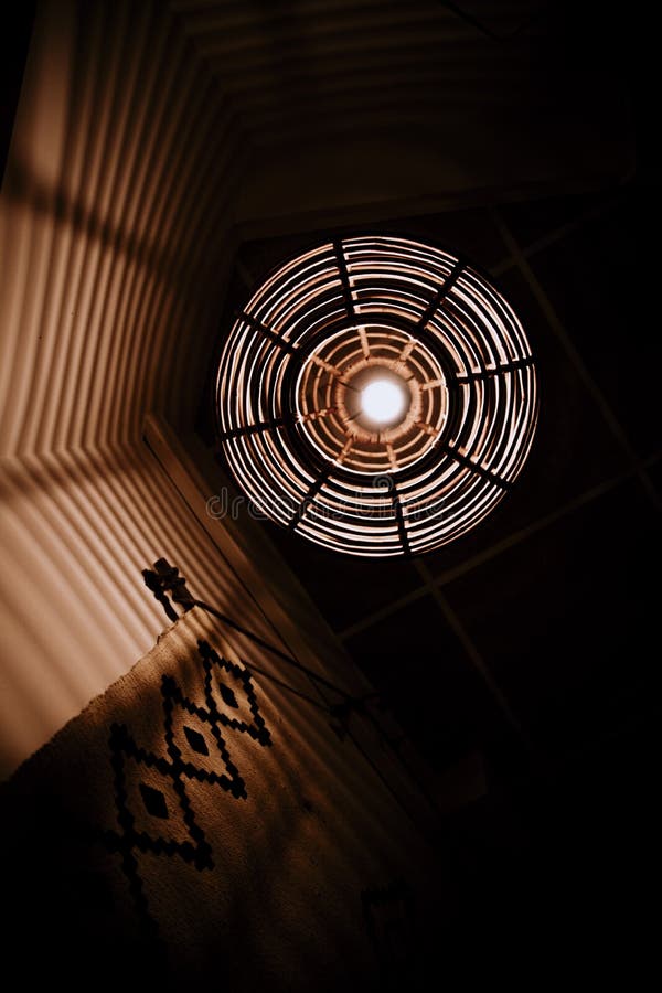 Grid Lamp Hanging from the Ceiling and View from Below with Reflections ...